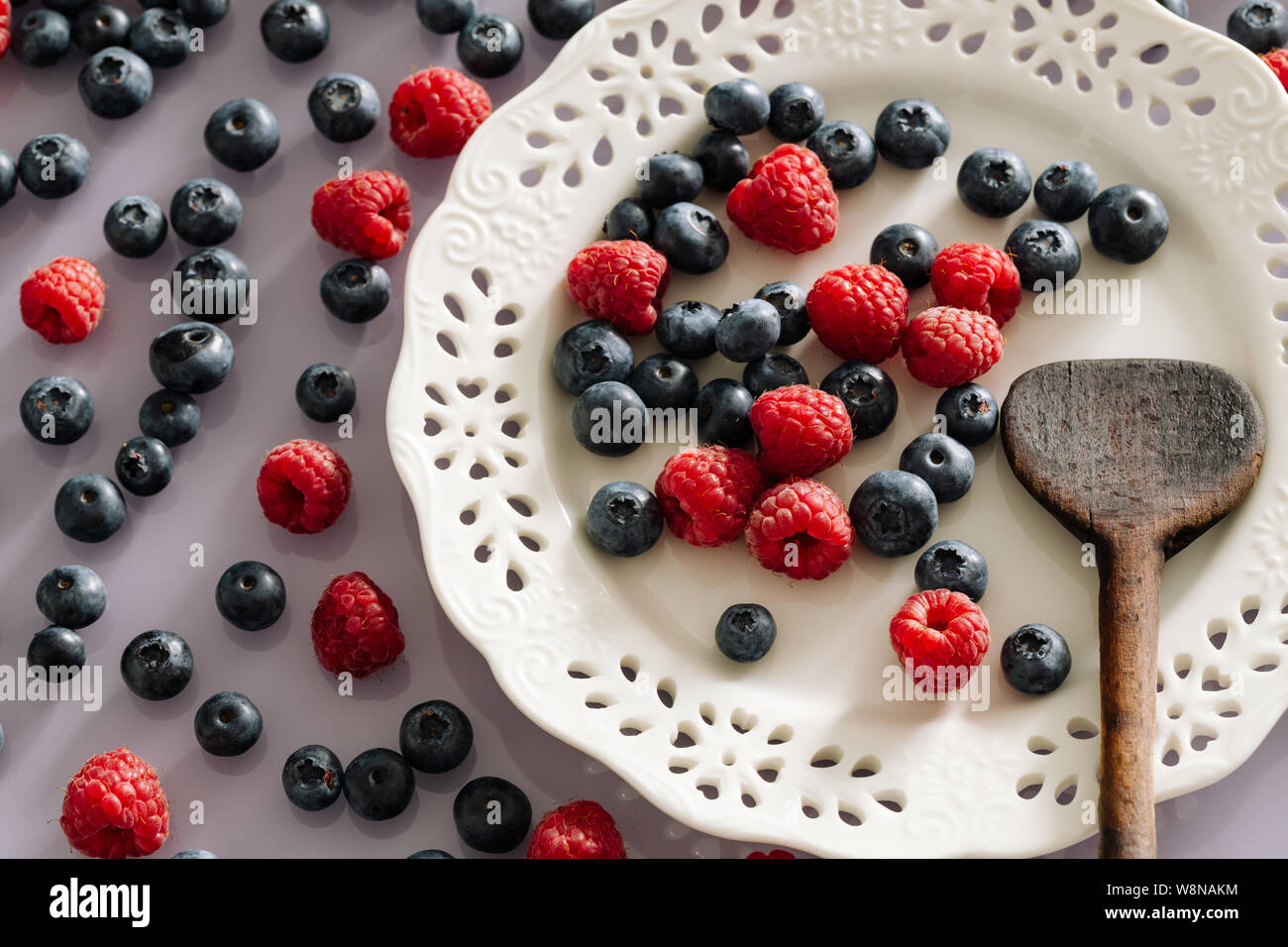 Seasonal fruits, blueberry and raspberry Stock Photo - Alamy