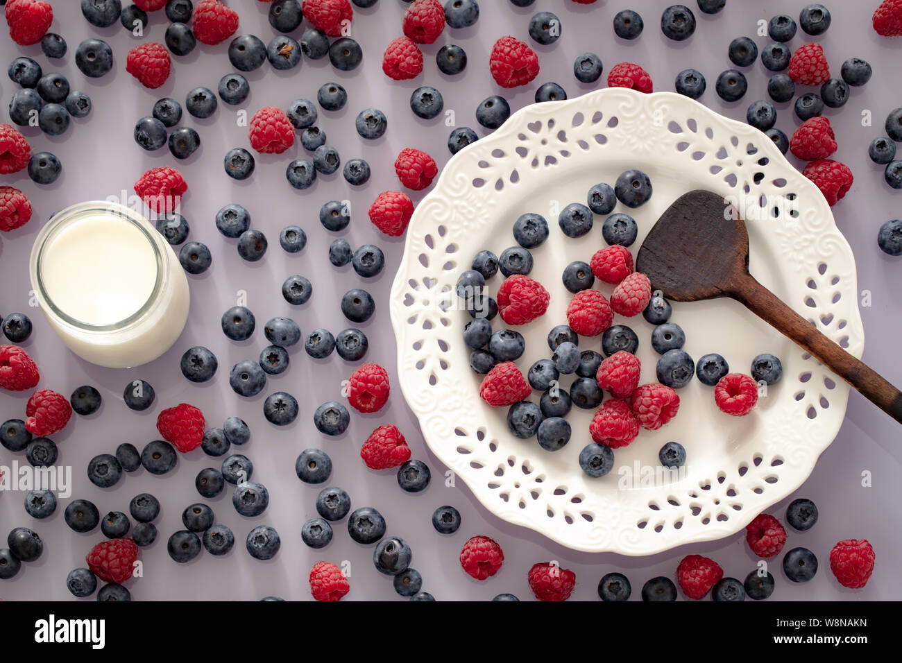 Seasonal fruits, blueberry and raspberry Stock Photo - Alamy