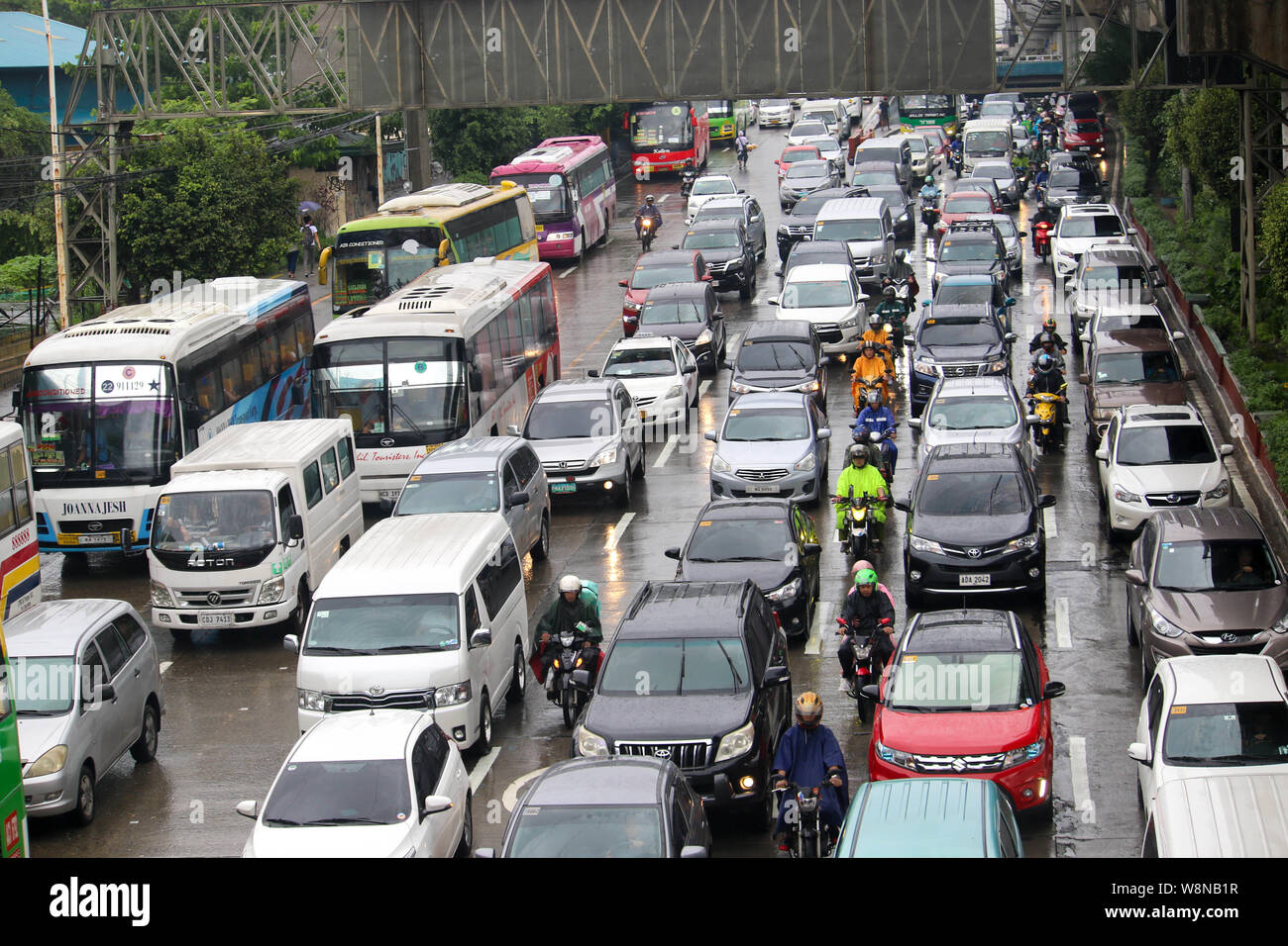 A congested traffic in EDSA on a rainy Friday afternoon even the number ...