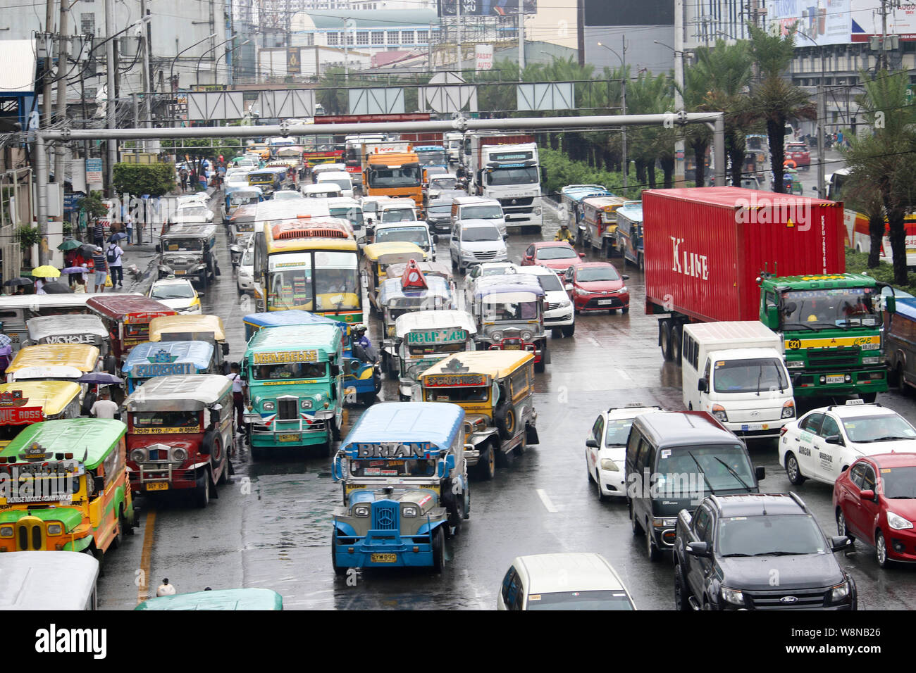 A congested traffic in EDSA on a rainy Friday afternoon even the number ...