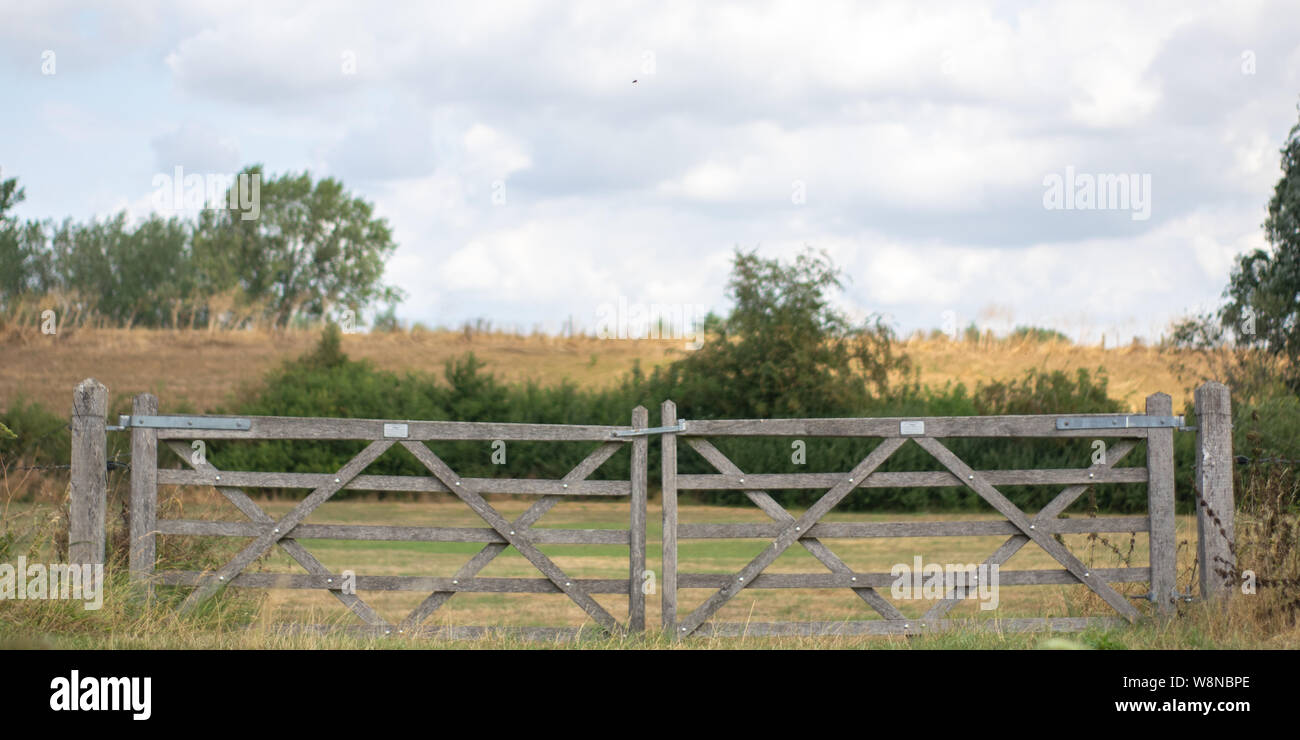 wooden gate for a Dutch pasture and a dike that stops the water in the ...