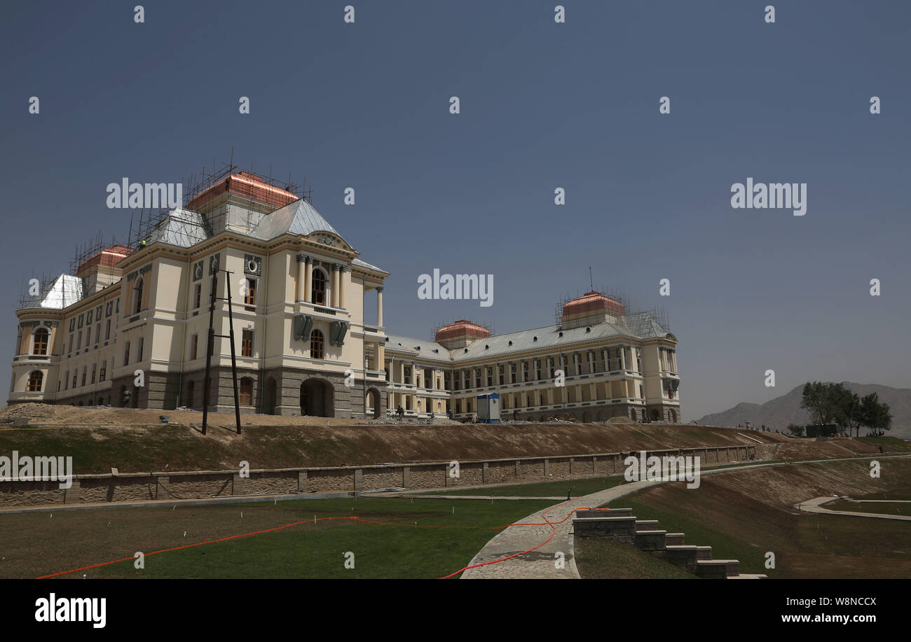 Kabul, Afghanistan. 8th Aug, 2019. Workers pave the ground of the Darul ...