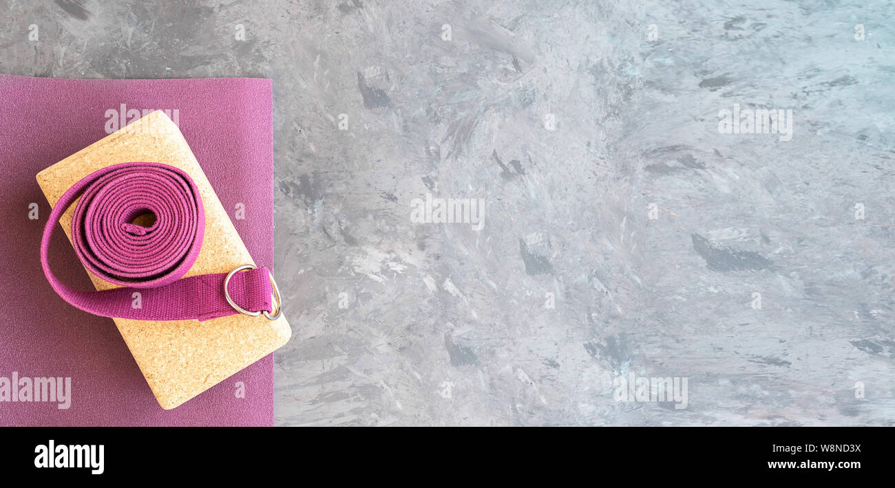 Open yoga mat with cork block and yoga strap Yoga practice props ...