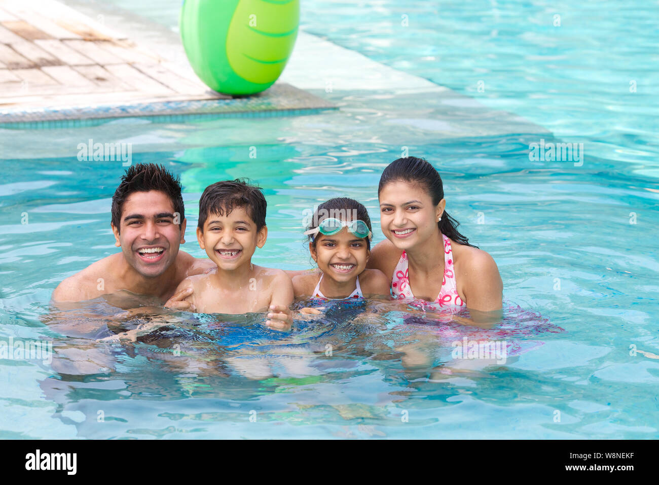 Brother sister in pool hi-res stock photography and images - Alamy