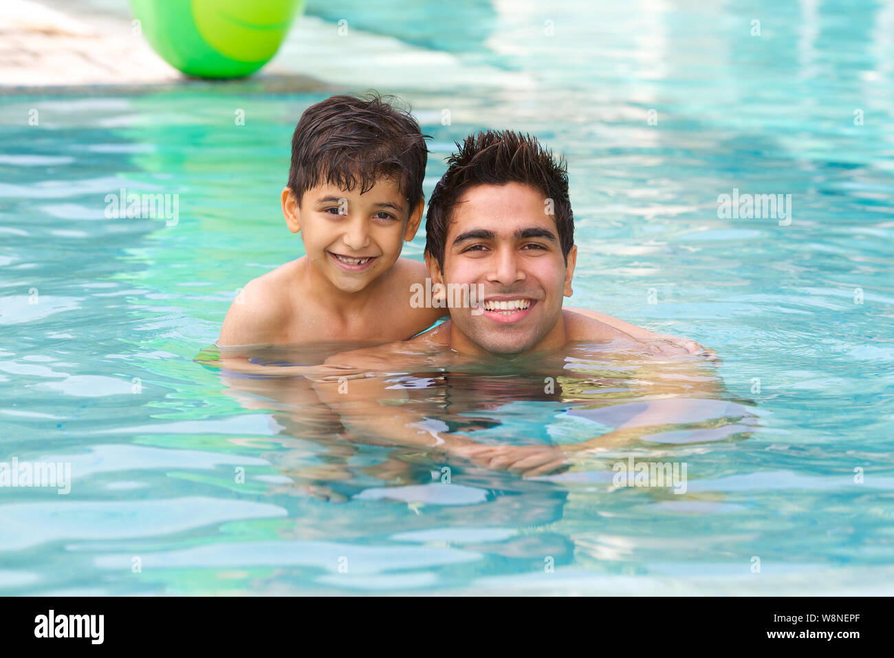 Father son swimming pool hi-res stock photography and images - Alamy