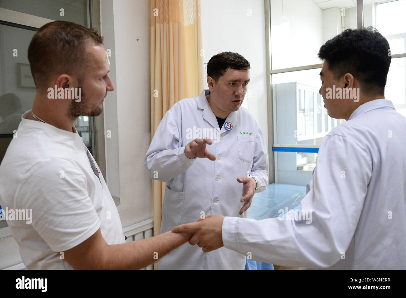 Translator working in hospital hi-res stock photography and images - Alamy