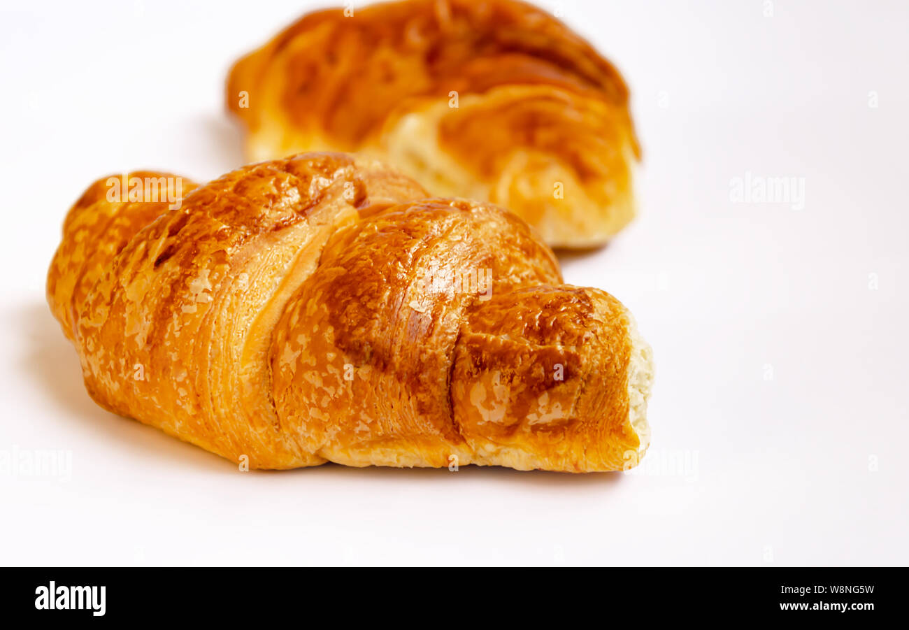 croissant with a beautiful crisp, tasty pastries on a white background ...