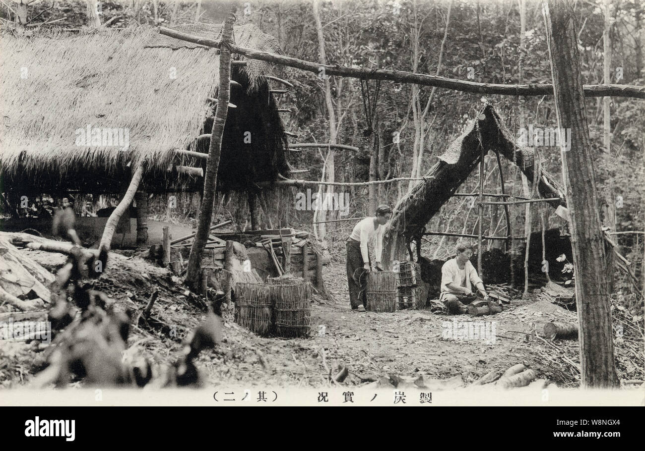 [ 1920s Japan - Japanese Charcoal Production ] — A man is sawing a log ...