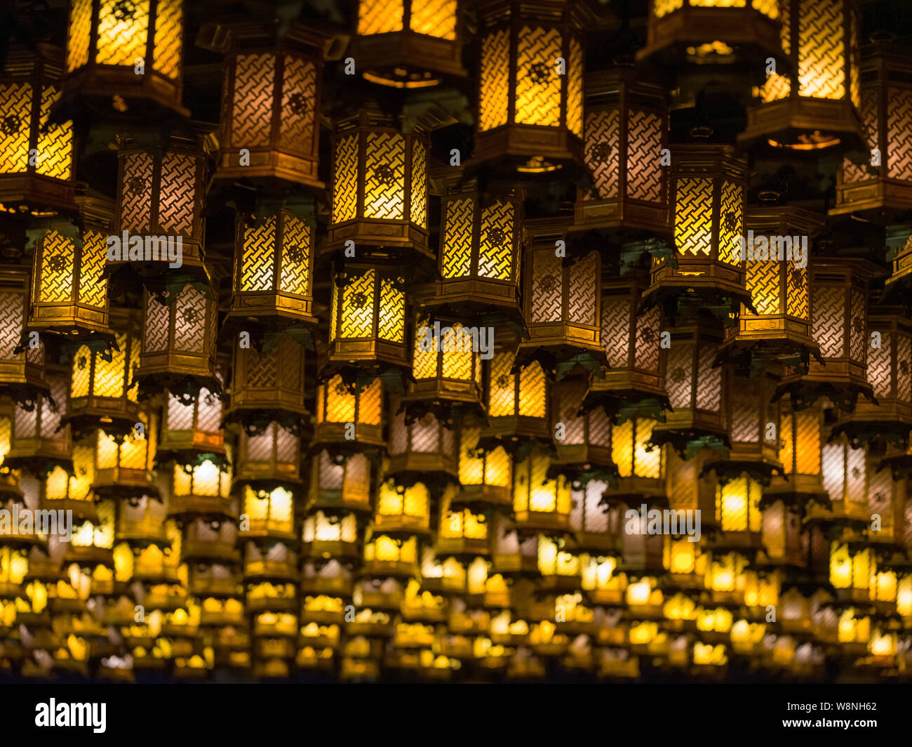 Endless sea of rooftop candle lanterns / lights in Asian temple Stock ...