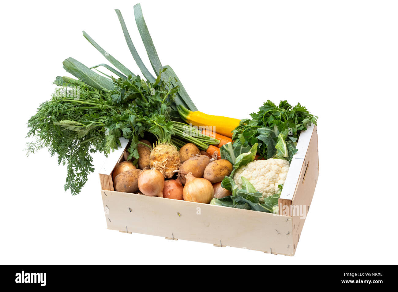 Wooden box of fresh vegetables from farmers market isolated on white ...