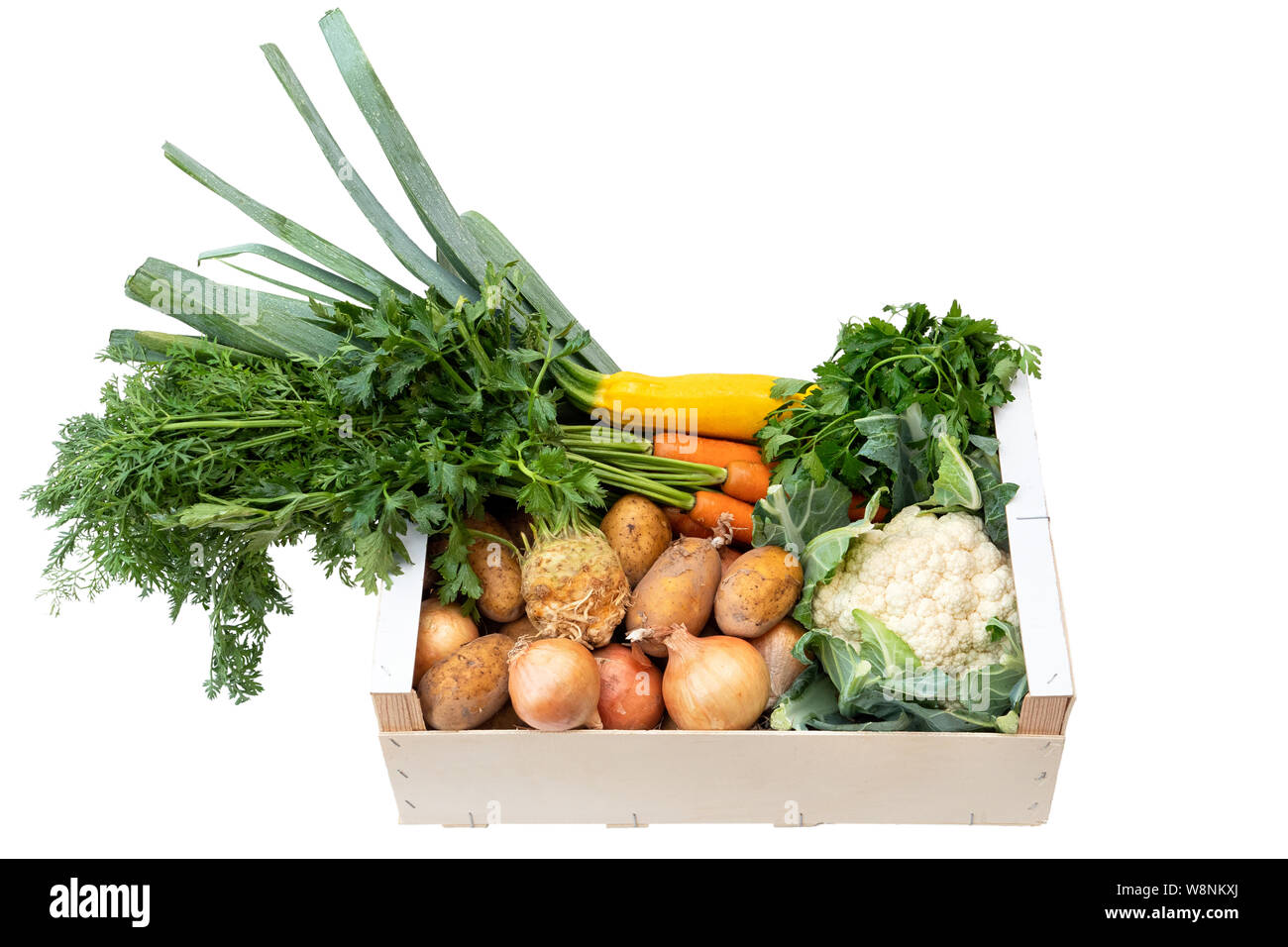 Wooden box of fresh vegetables from farmers market isolated on white ...