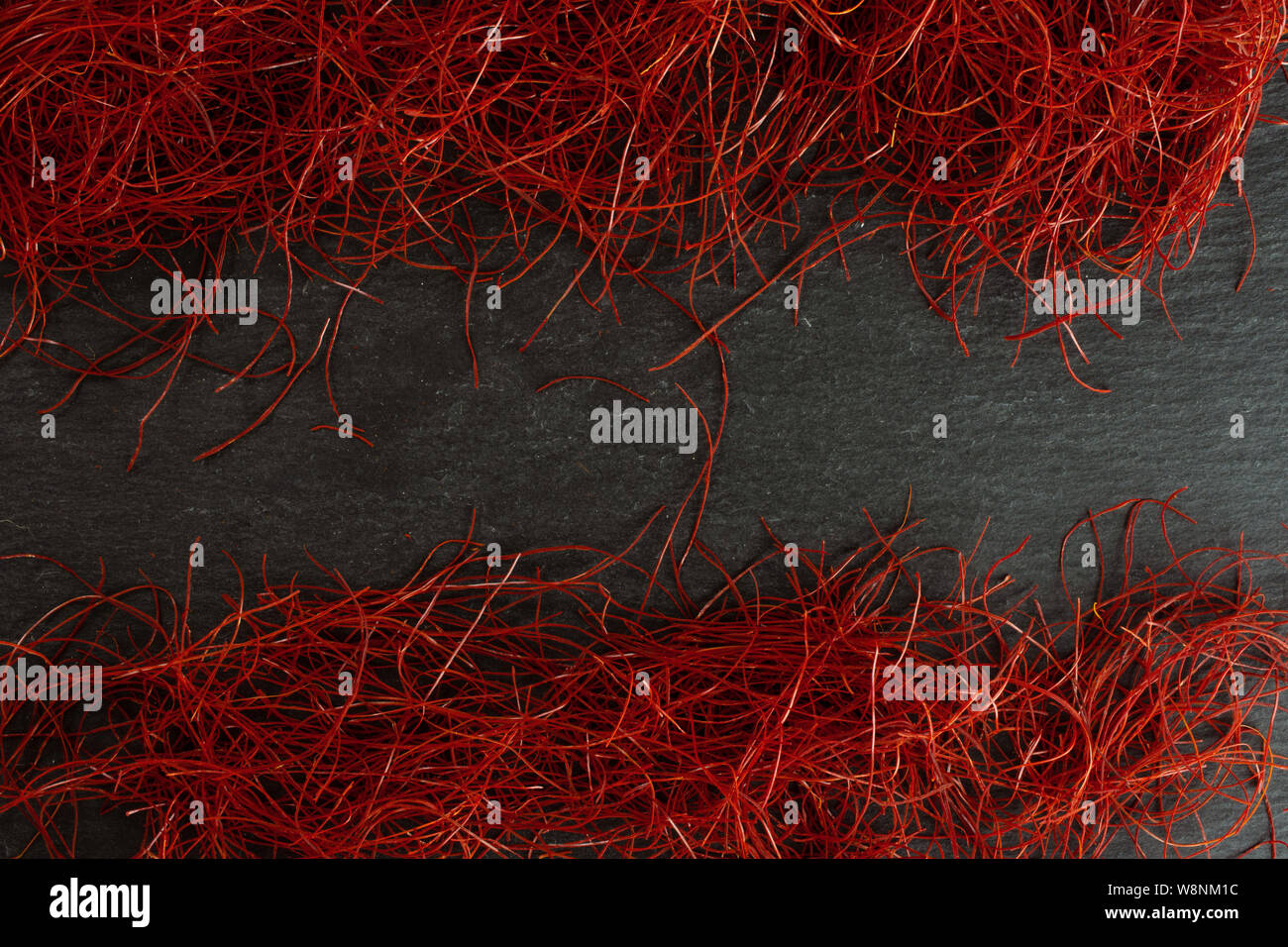 Lot of whole red chili pepper threads copyspace in the middle flatlay ...