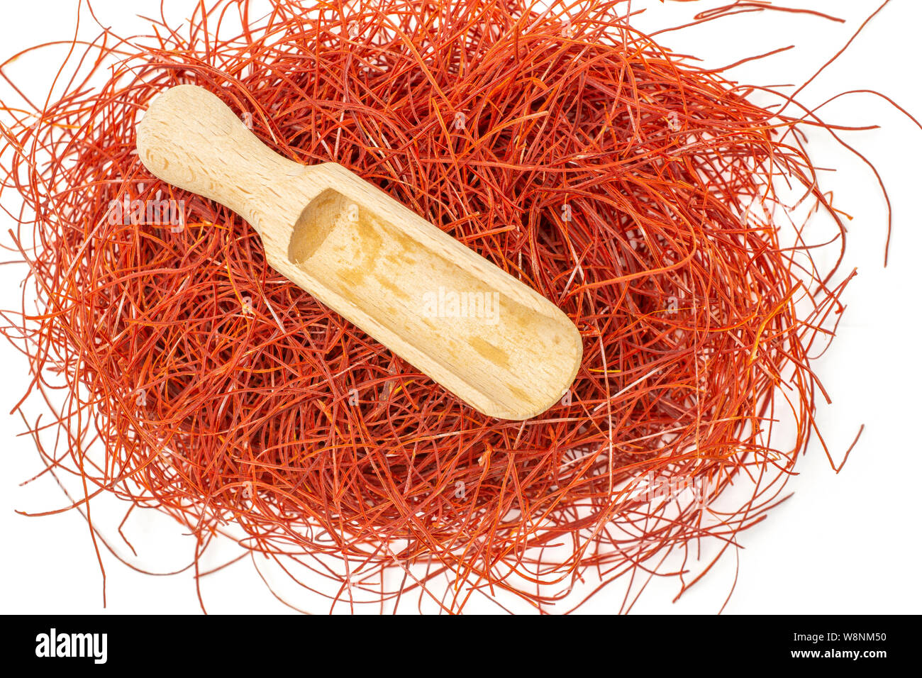 Lot of whole red chili pepper threads closeup with wooden scoop flatlay ...