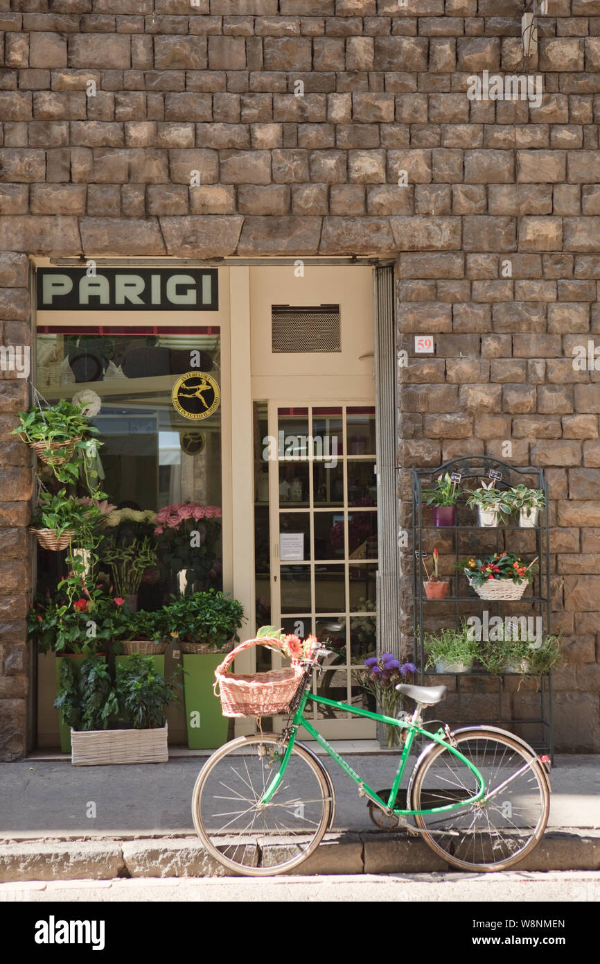 Green Bicycle with Basket outside Italian Shop in Florence Stock Photo ...
