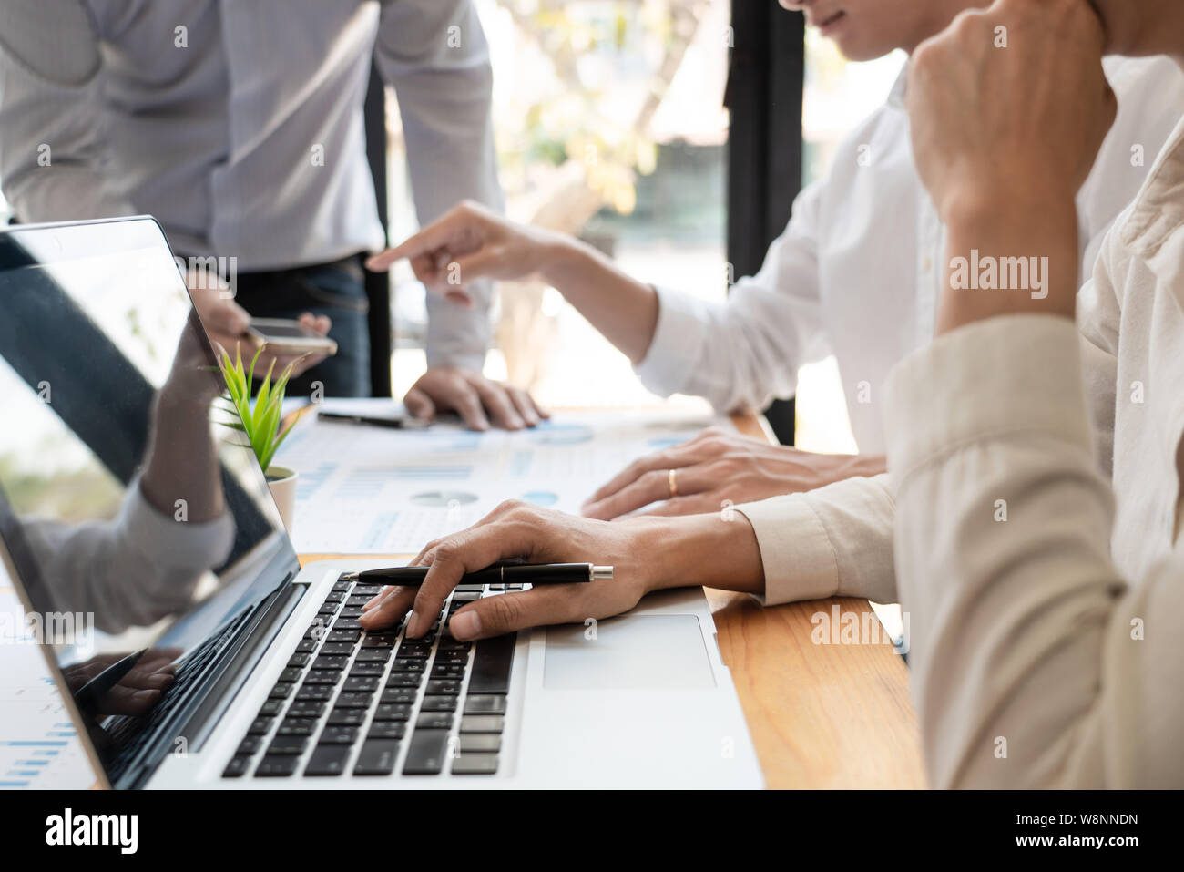 Business People Meeting to analyse and discuss and brainstorming the ...