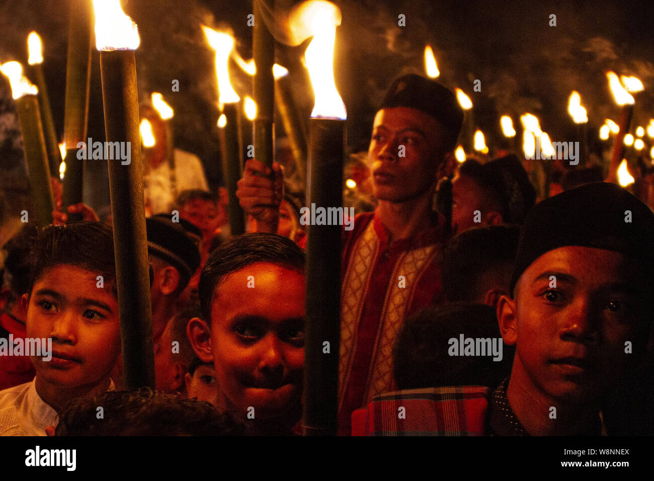 Group of people with torches hi-res stock photography and images - Alamy