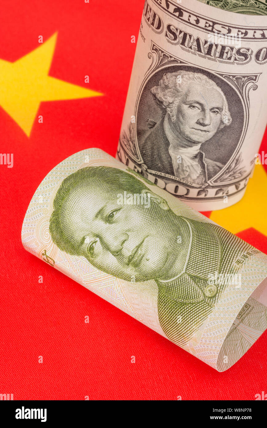 Macro close-up U.S 1 Dollar bill banknote & Chinese 1 Yuan Renminbi ...