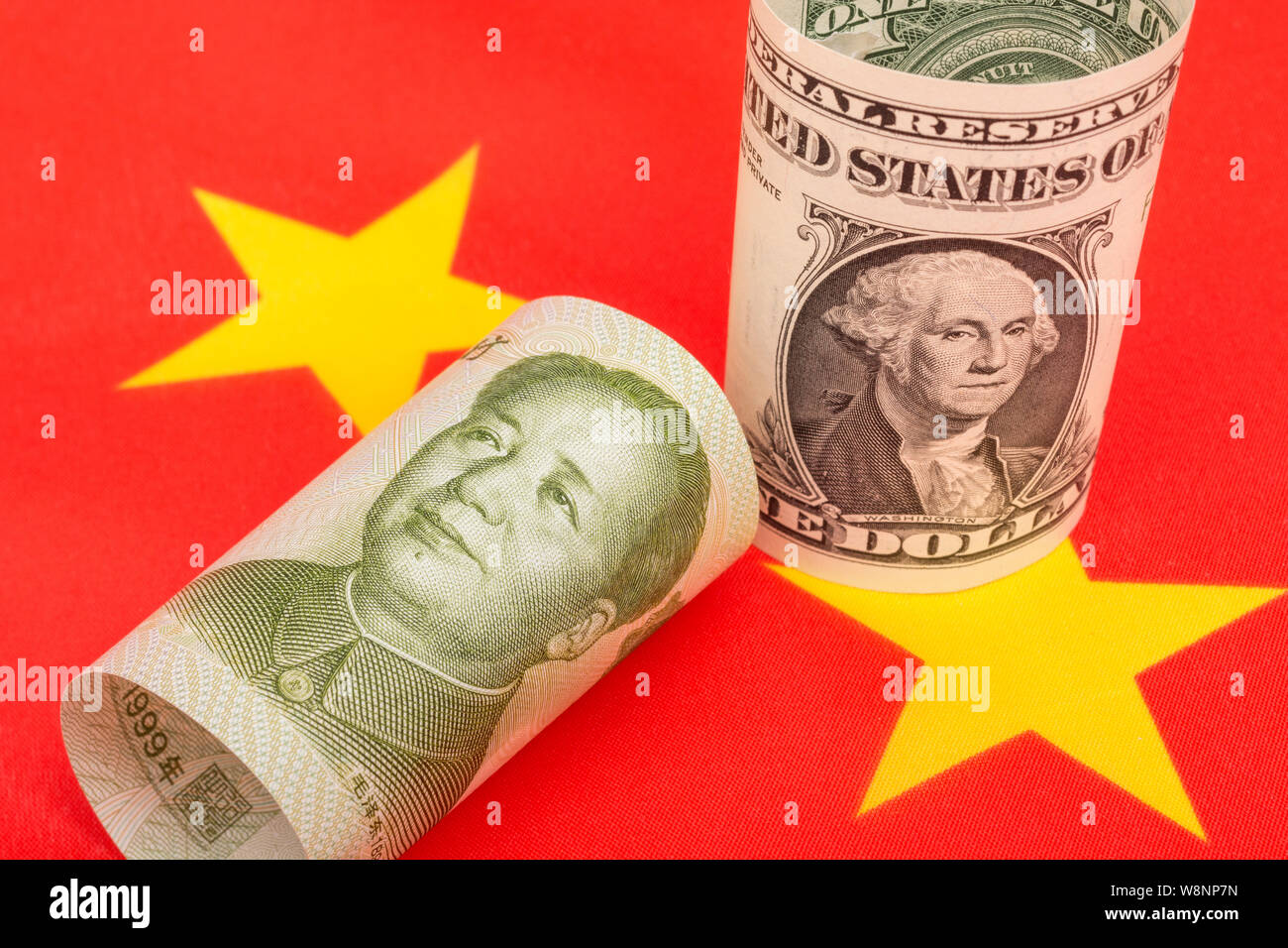 Macro close-up U.S 1 Dollar bill banknote & Chinese 1 Yuan Renminbi ...