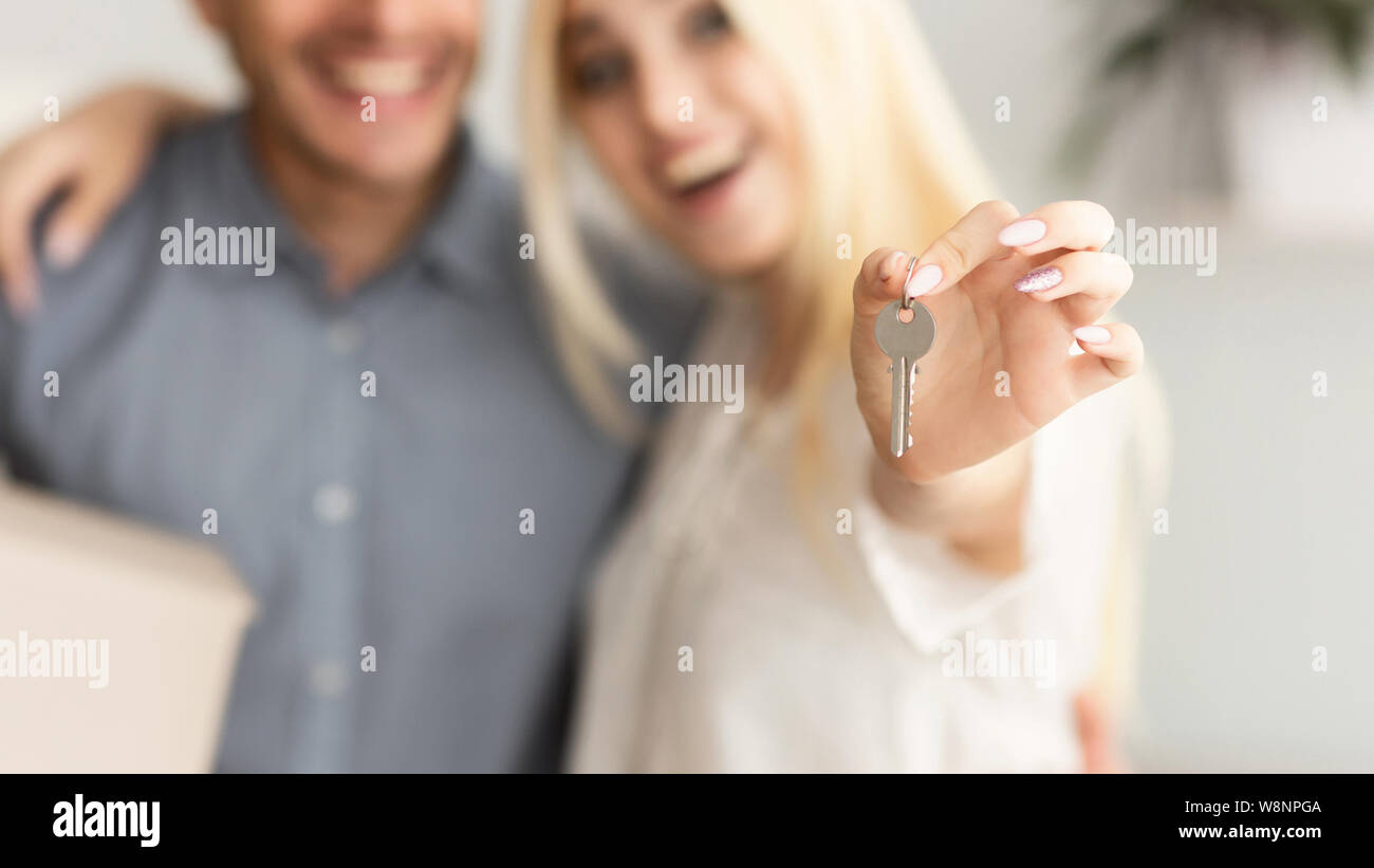 Young Loving Couple Showing Their New Home Key, Cropped Stock Photo - Alamy