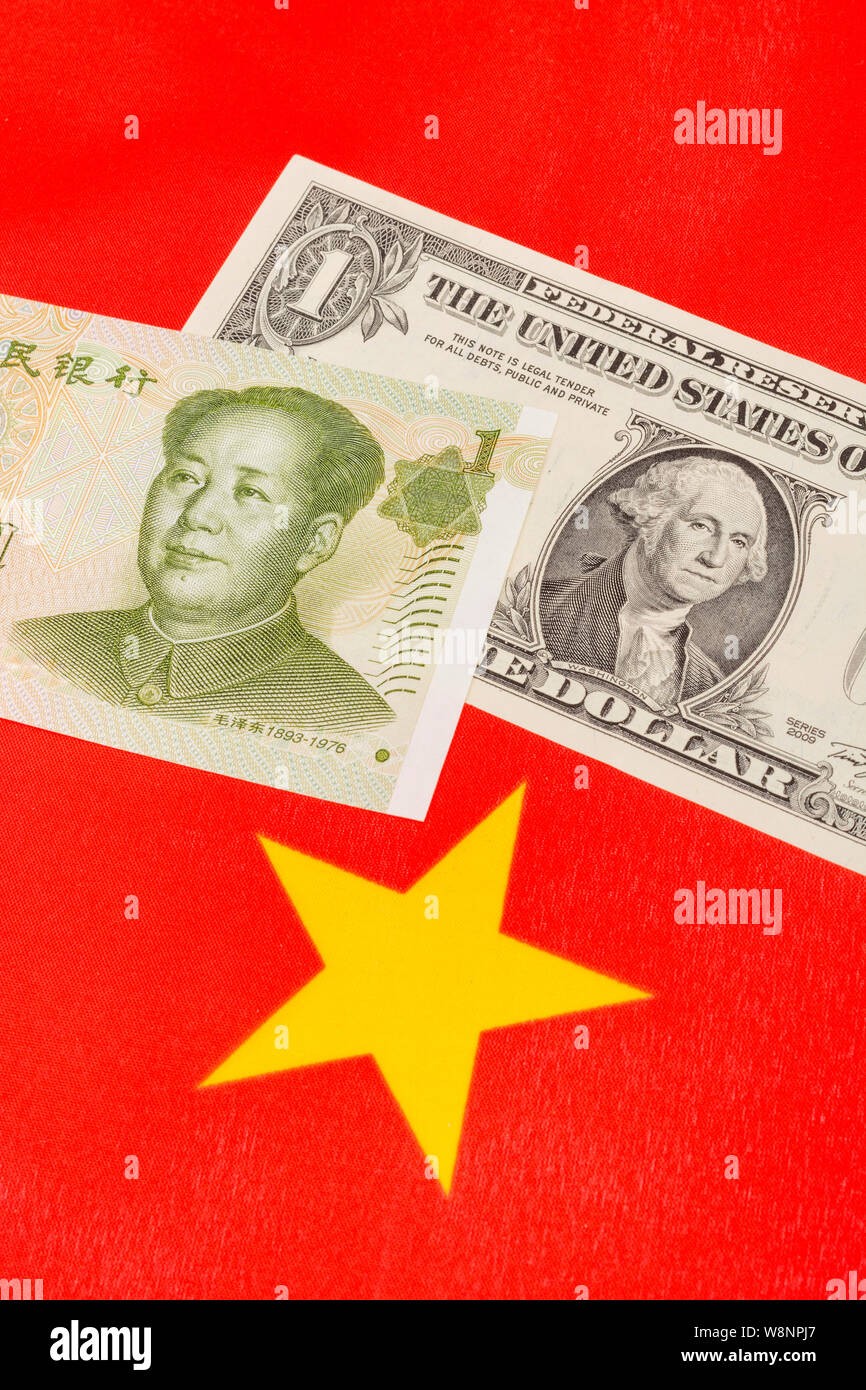 Close-up shot U.S. 1 Dollar bill banknote & Chinese 1 Yuan Renminbi ...