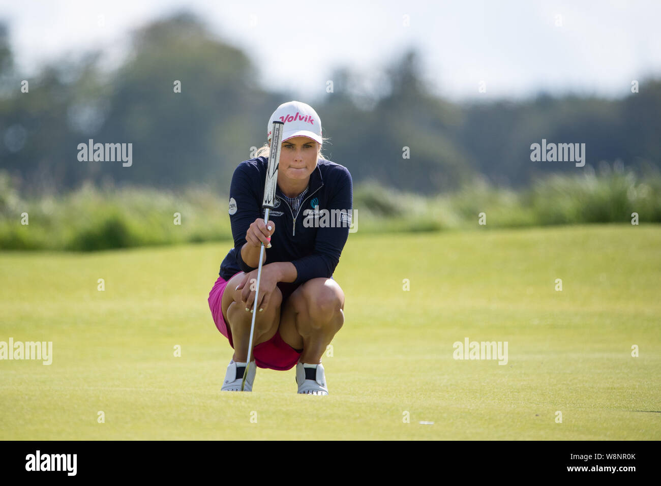 Scotland's Carly Booth lines up her putt on the 17th hole during day ...