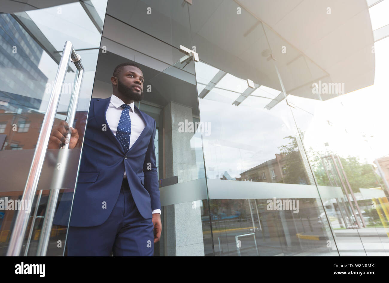 Man walking out exit door hi-res stock photography and images - Alamy
