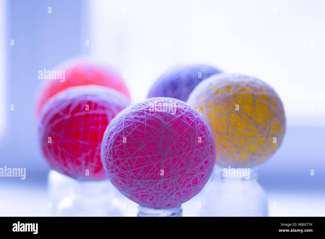 Multicolor balloons drying to become yarn decorative balls Stock Photo ...