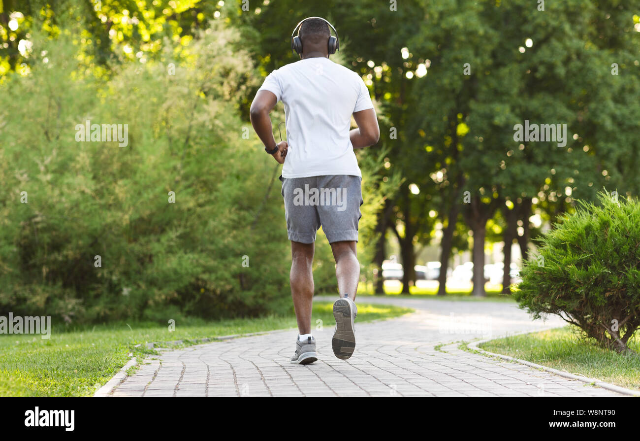 African american man running hi-res stock photography and images - Alamy
