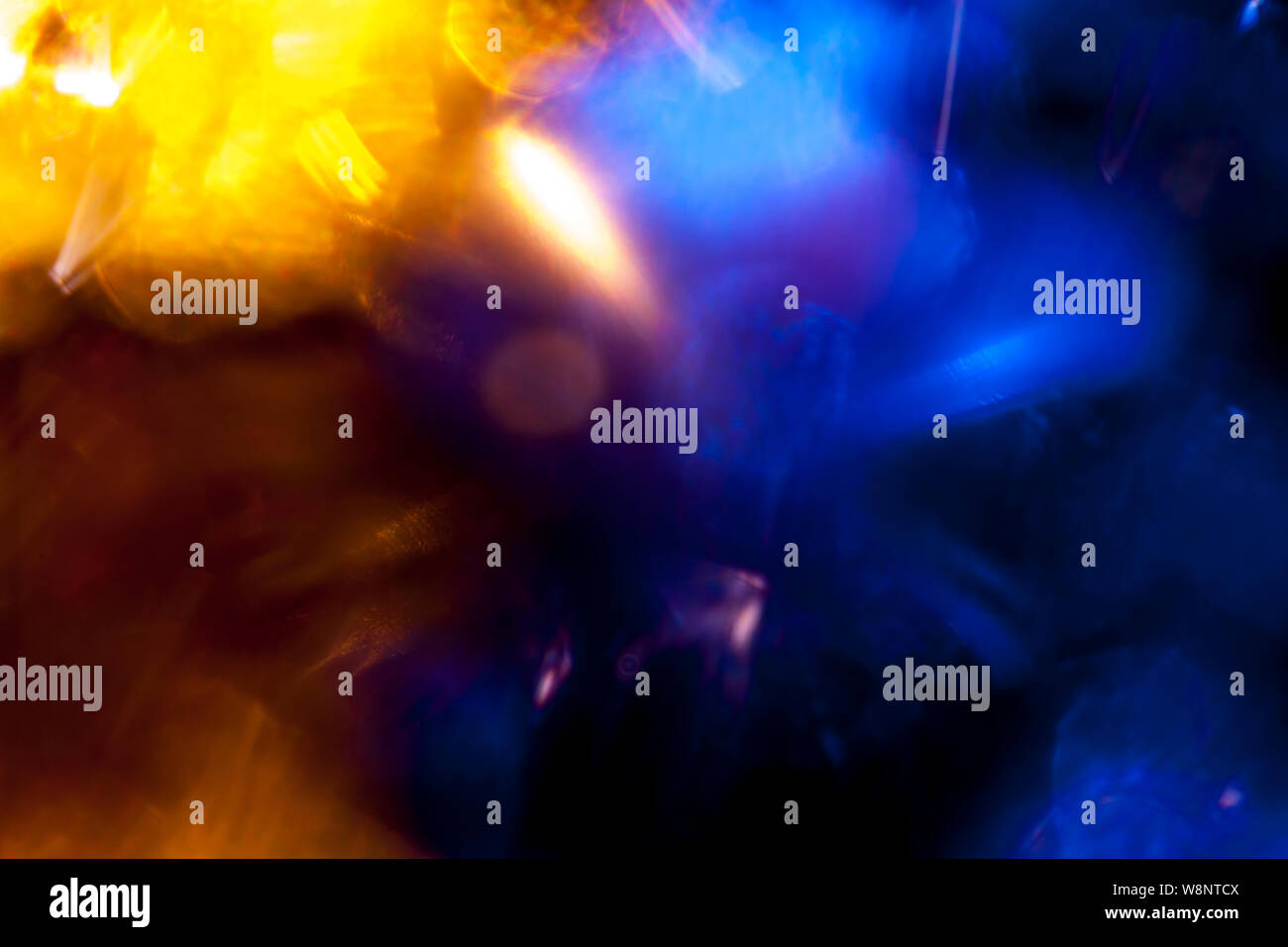 Smooth vivid spots of bright light shining on dark background Stock ...