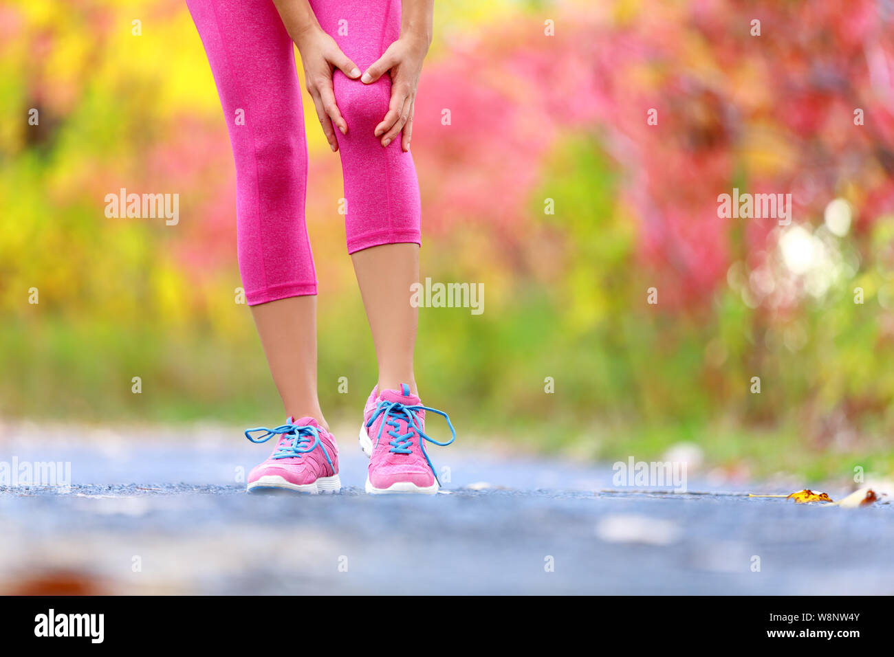 Knee Injury - running sport knee injuries on woman. Female runner with ...