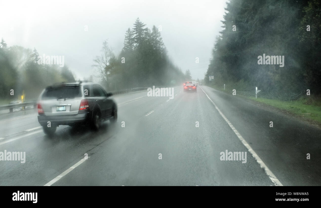 Car in rainy road hi-res stock photography and images - Alamy