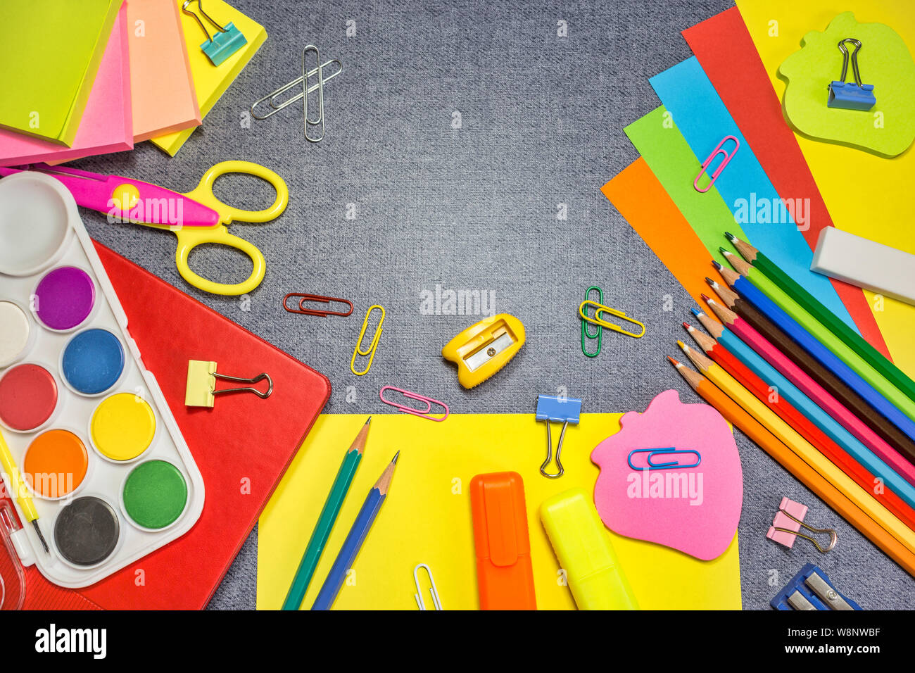 Back to school background with colorful school supplies. Top view with ...