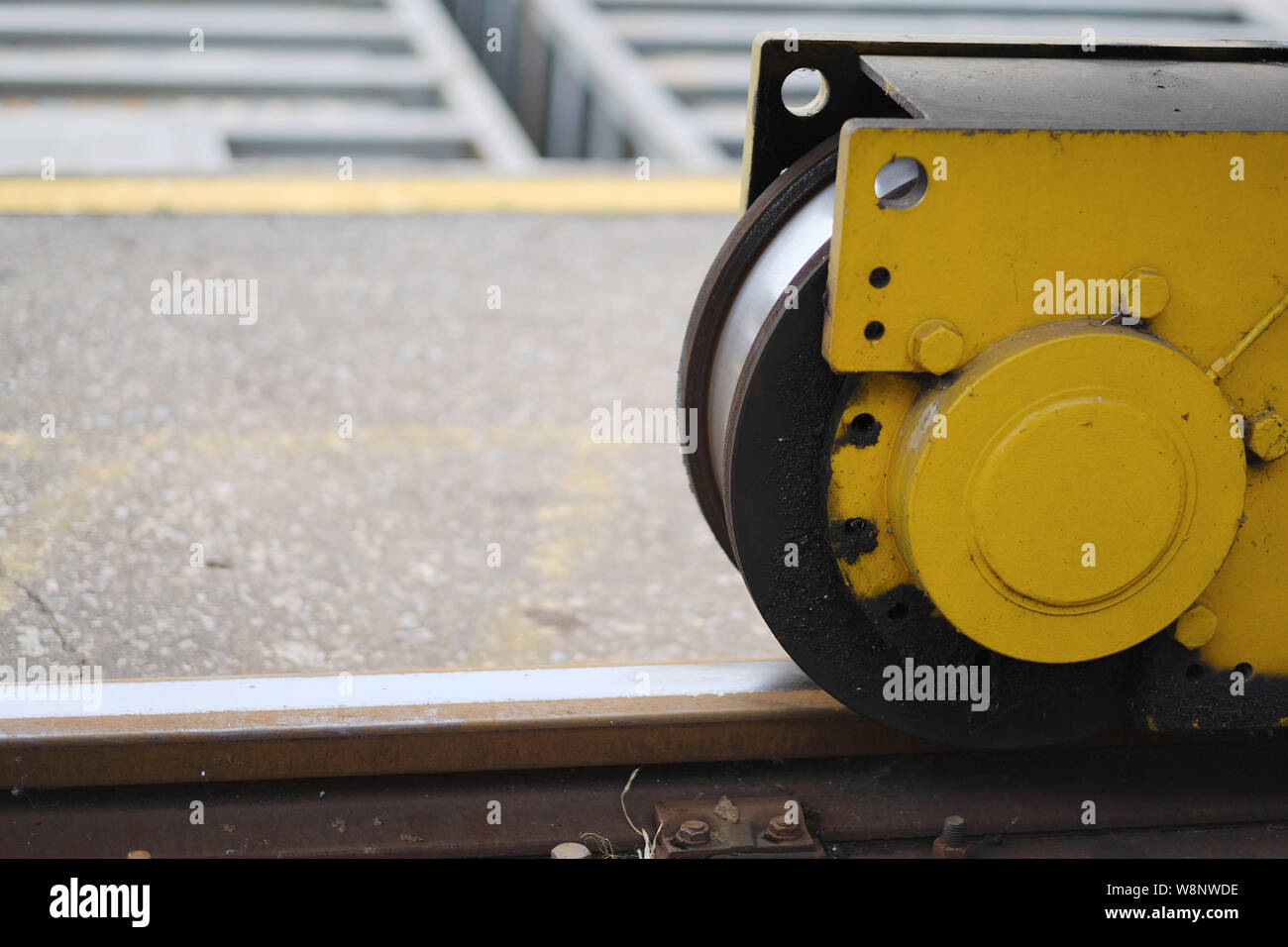 The bridge crane wheel on the guide rails in the container terminal ...