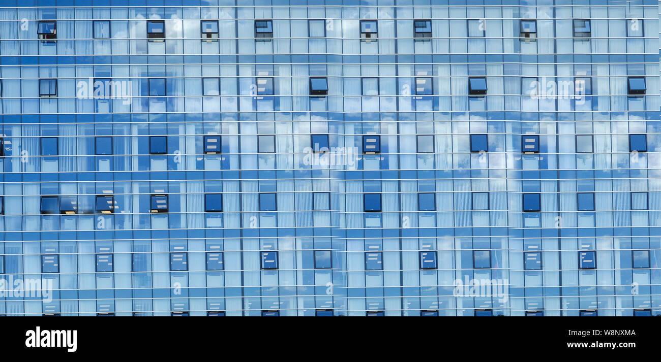 Modern building glass windows with sky reflection Stock Photo - Alamy