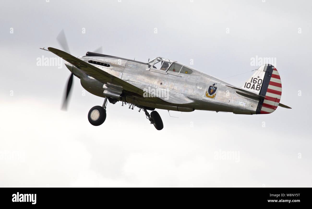 Curtiss-Wright P.40C (G-CIIO) taking off with the undercarriage ...