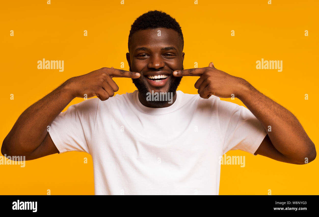 Portrait smiling african man showing hi-res stock photography and ...