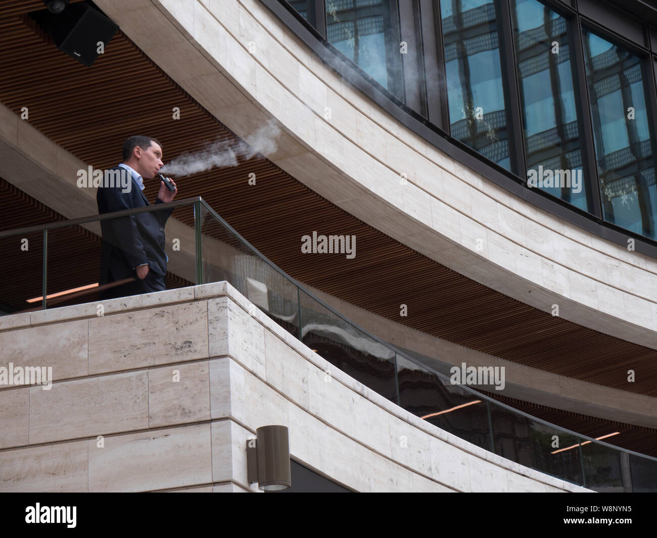 Office worker smoking outside hi-res stock photography and images - Alamy