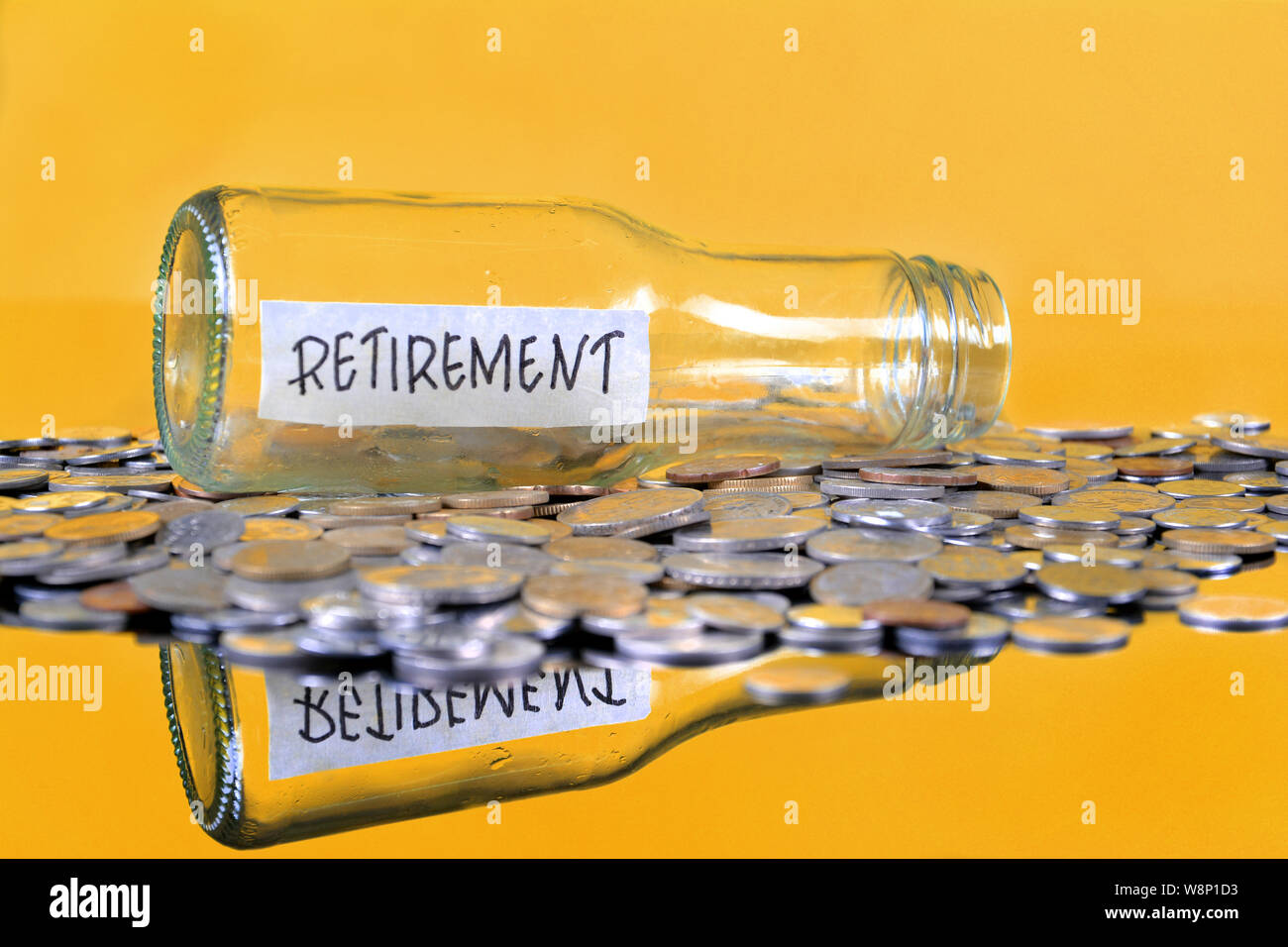 The word Retirement with stacked coins Stock Photo - Alamy
