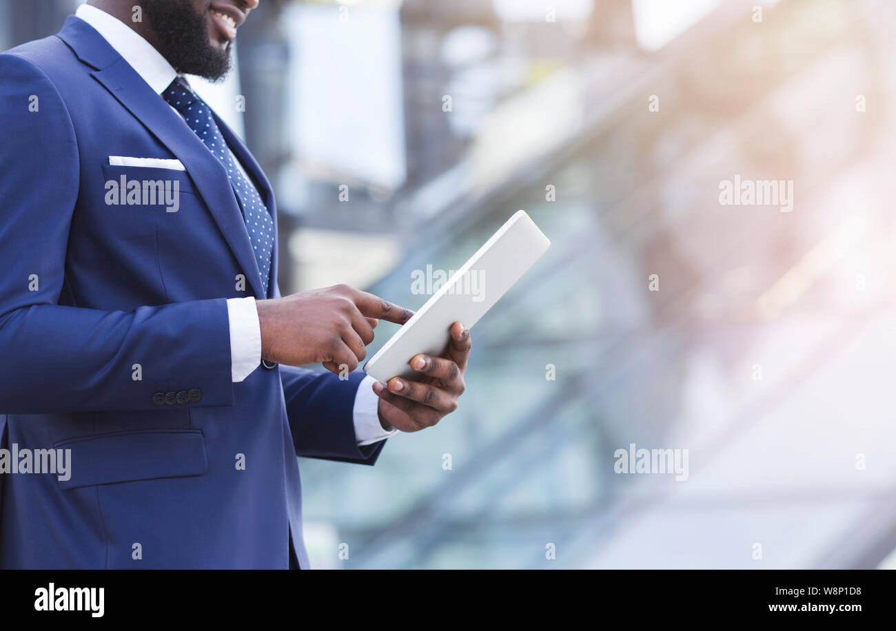 Closeup businessman walking tablet man hi-res stock photography and ...