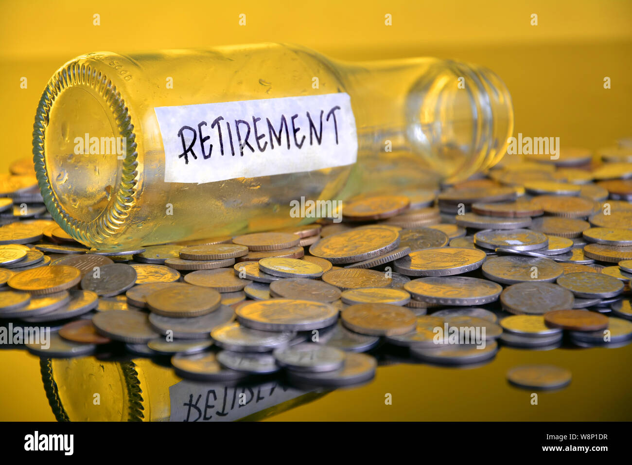 The word Retirement with stacked coins Stock Photo - Alamy