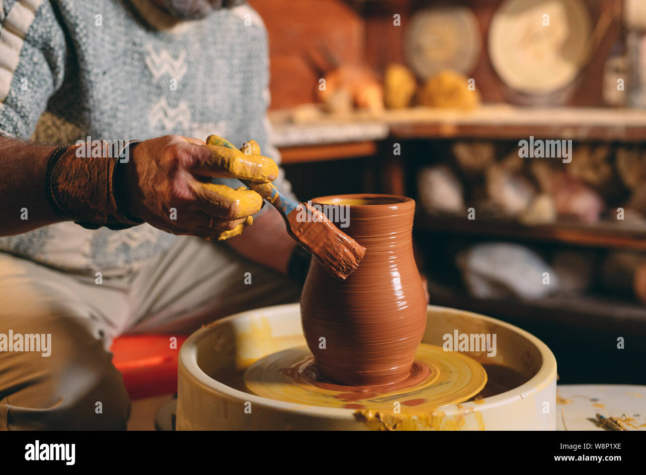 Man modeling with clay hi-res stock photography and images - Alamy