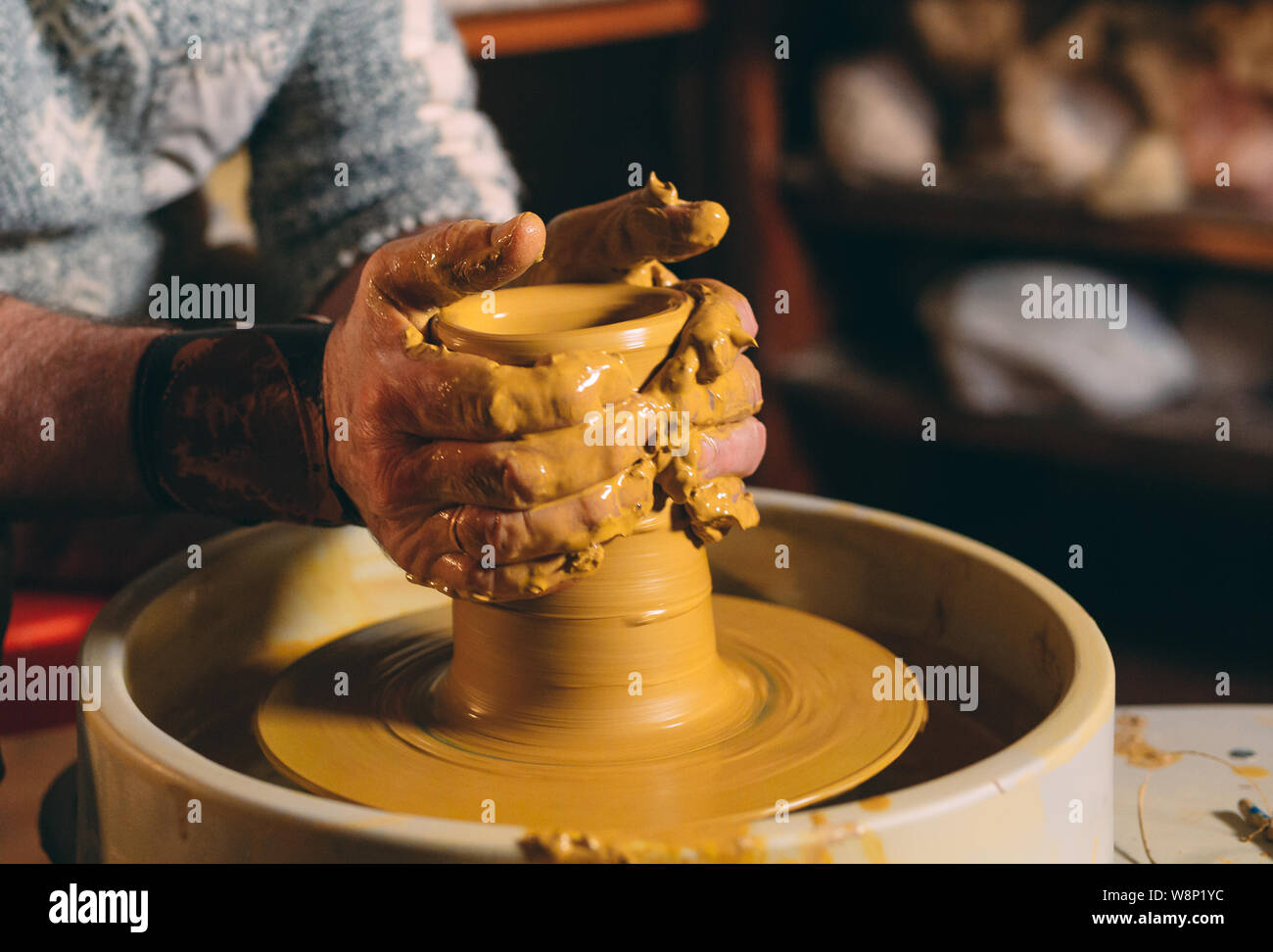 Man modeling with clay hi-res stock photography and images - Alamy