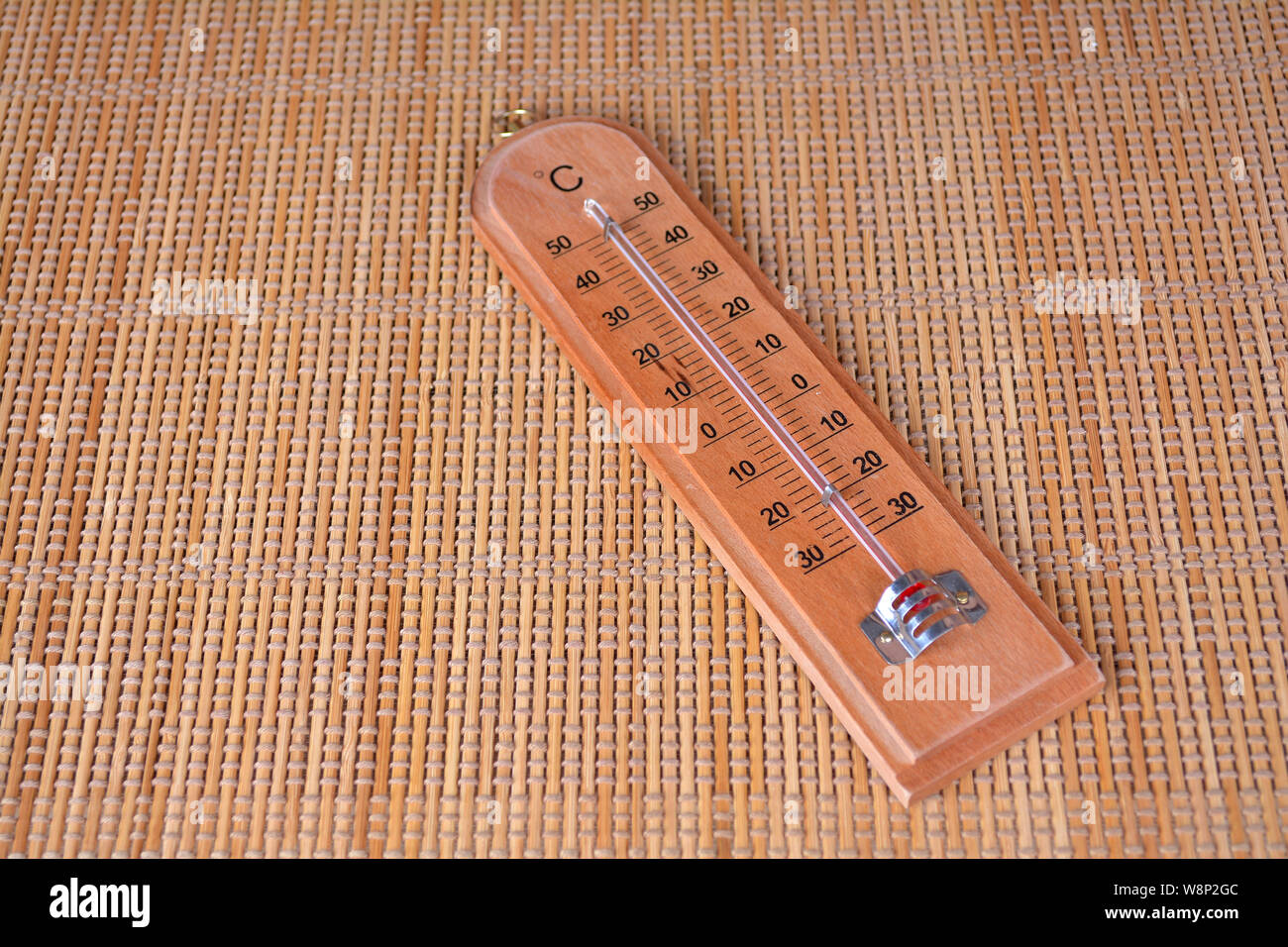Thermometer on the wood table Stock Photo - Alamy