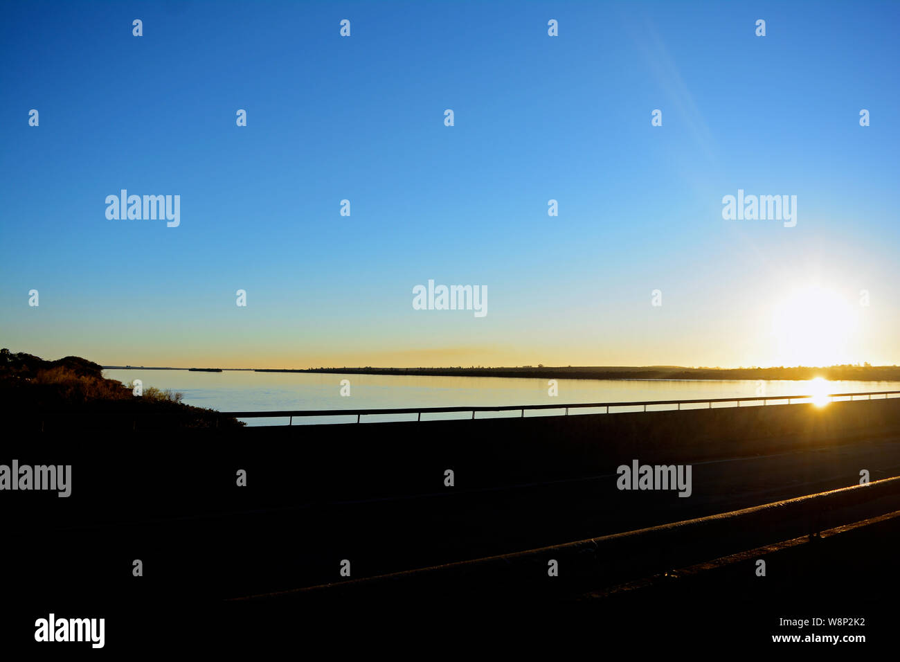 sunset at the river Stock Photo - Alamy