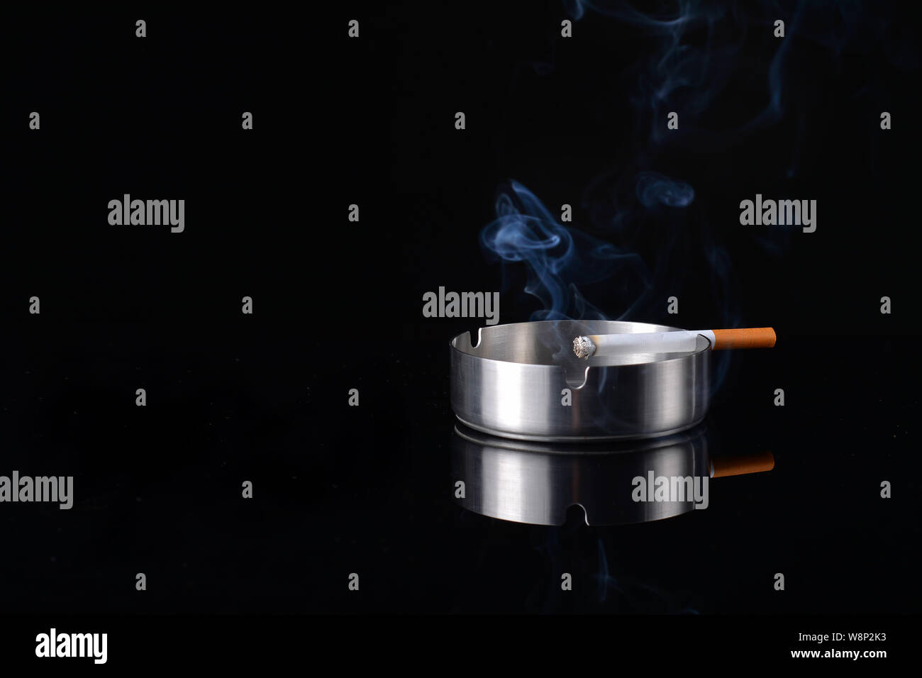Cigarette smoke is rising hi-res stock photography and images - Alamy