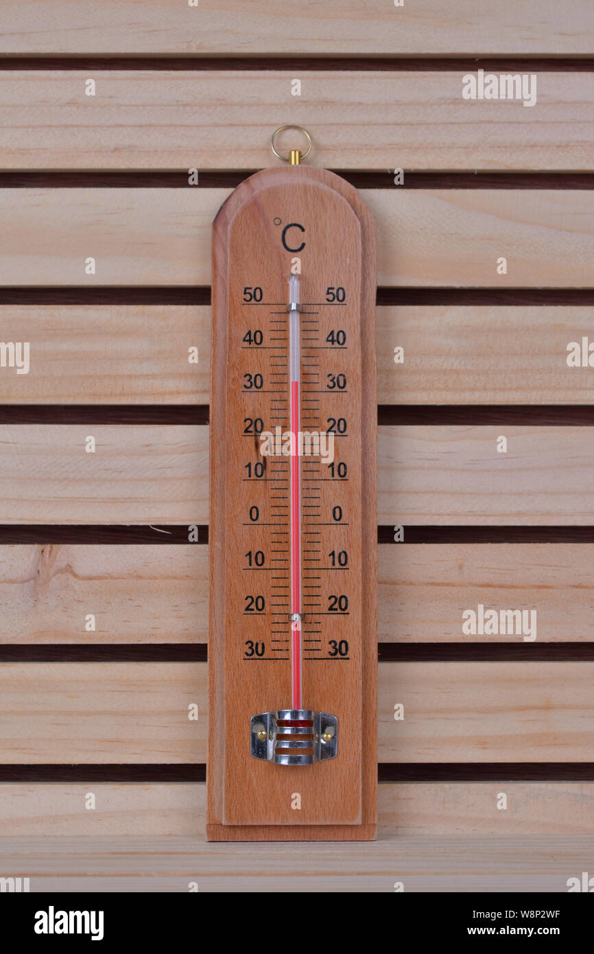 Thermometer on the wood table Stock Photo - Alamy