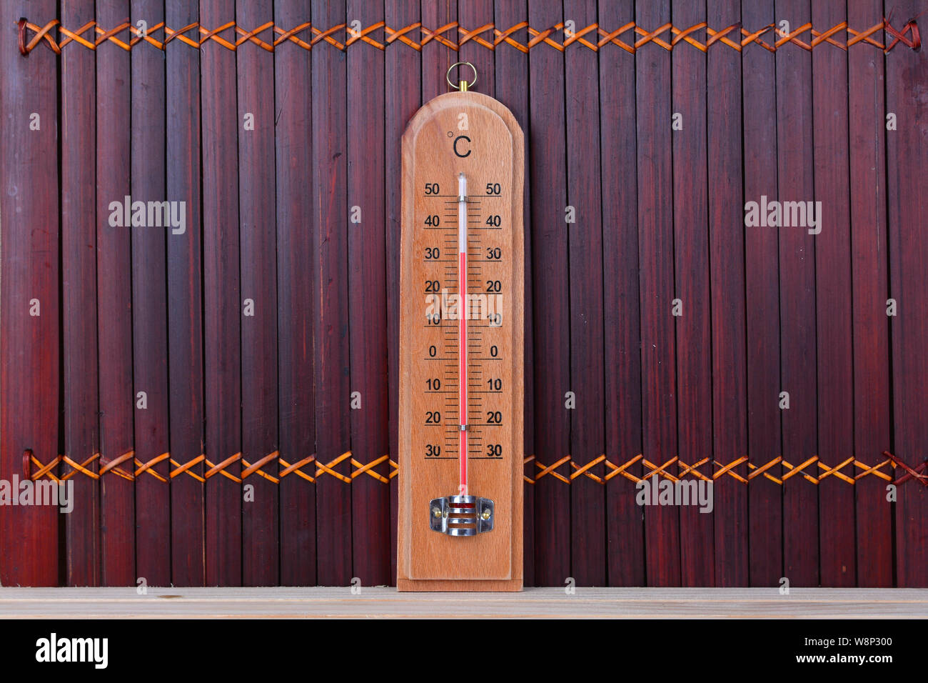 Thermometer on the wood table Stock Photo - Alamy