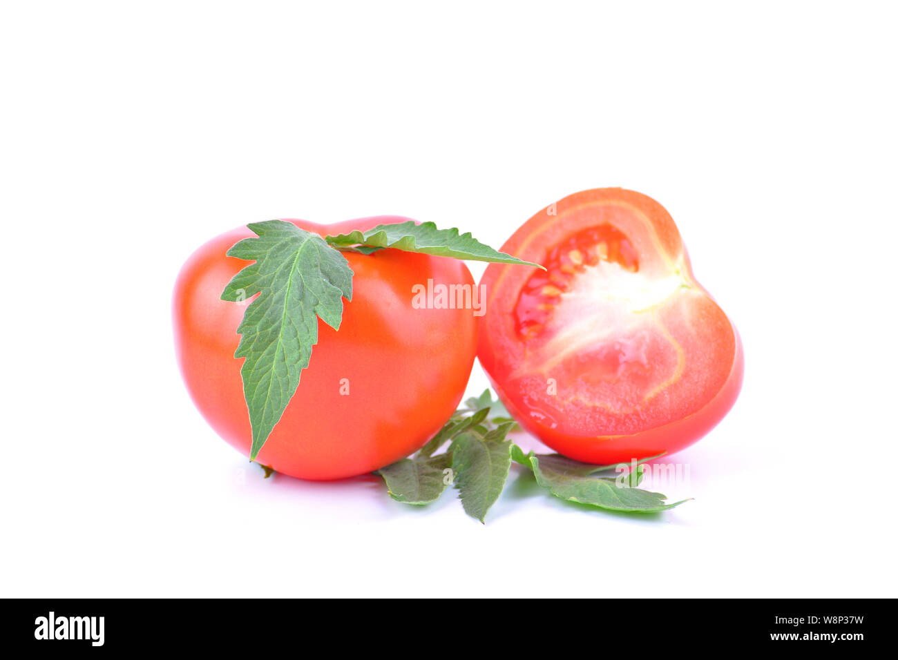 Tomatoes isolated on white Stock Photo - Alamy