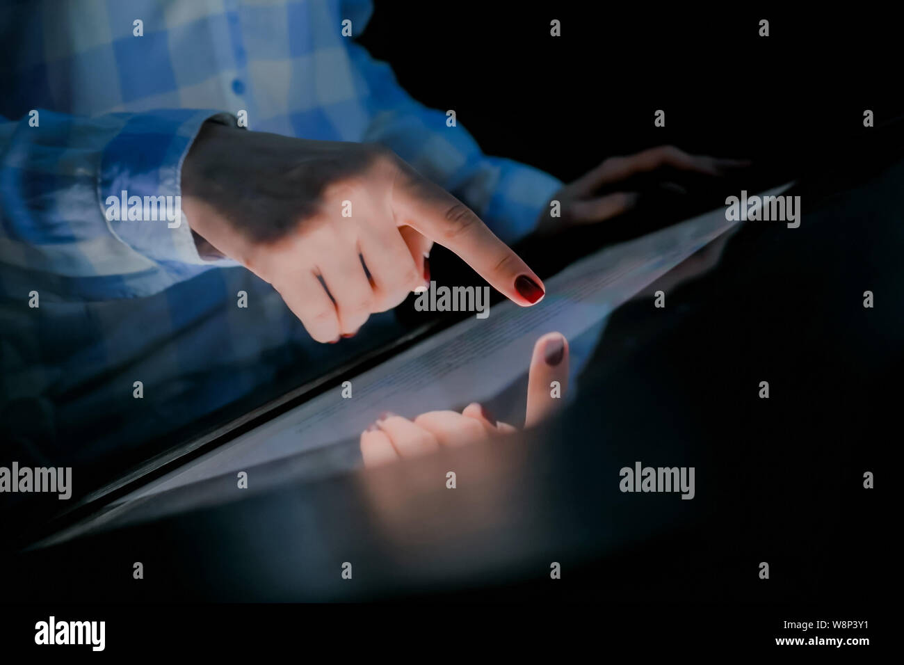 Woman using multimedia touchscreen display of interactive kiosk Stock ...