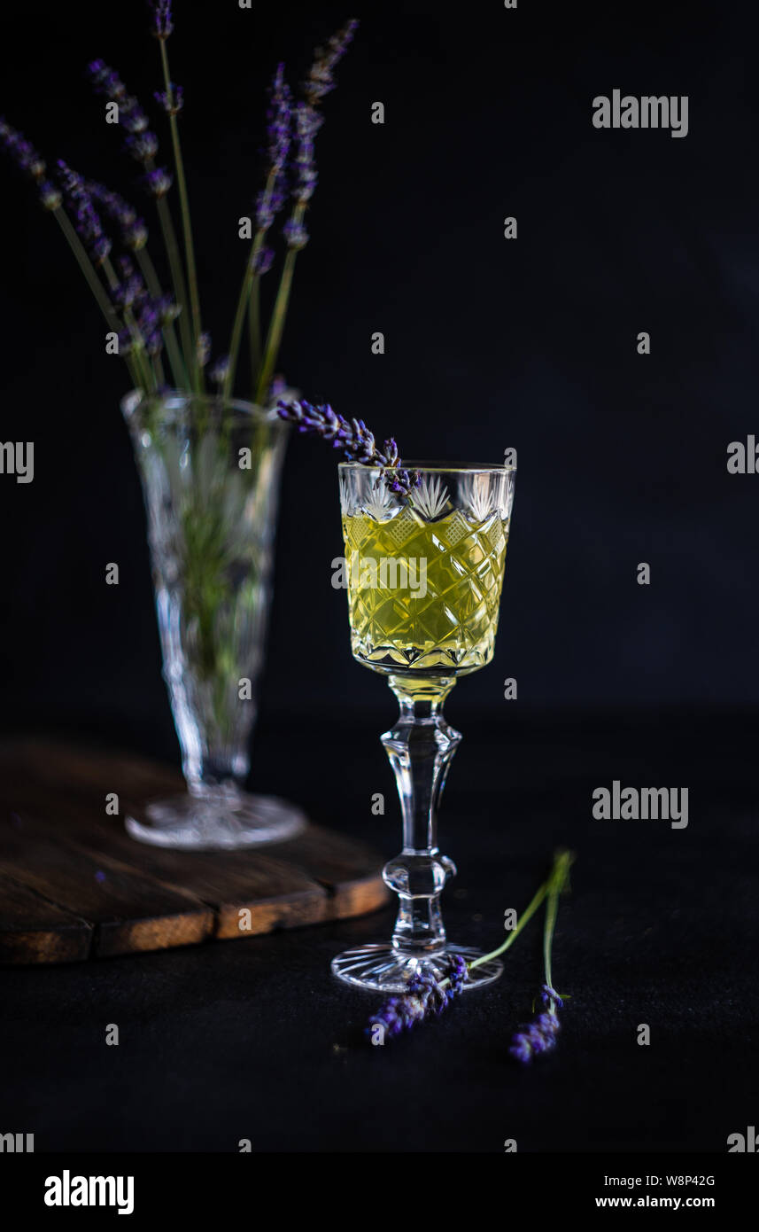 Traditional italian lemon alcohol drink limoncello with lavender ...